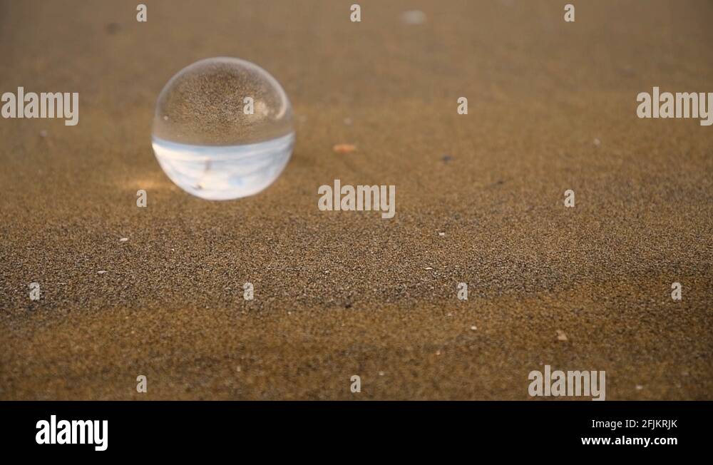 crystal ball reflecting upside down with zooming looking effect on a ...