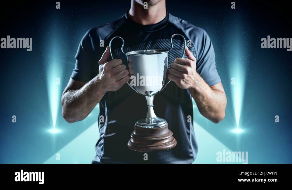 Winner holding trophy Stock Videos & Footage - HD and 4K Video Clips ...