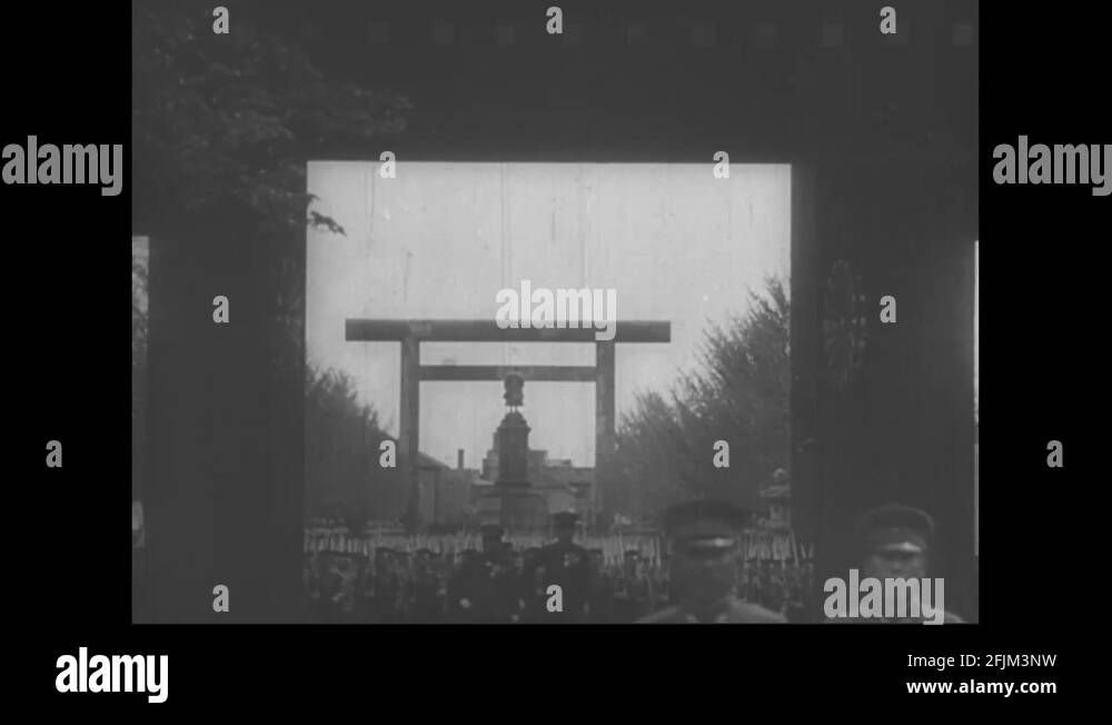 Japanese soldiers march in front of the Shinto shrine - 1946 Stock ...