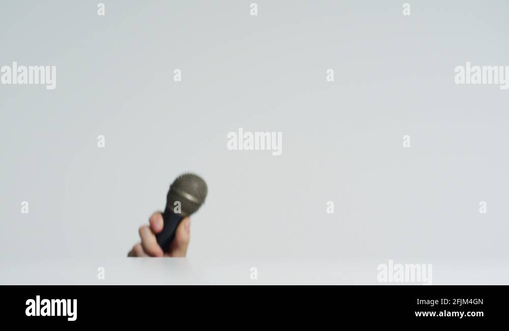 Raising microphone Stock Videos & Footage - HD and 4K Video Clips - Alamy
