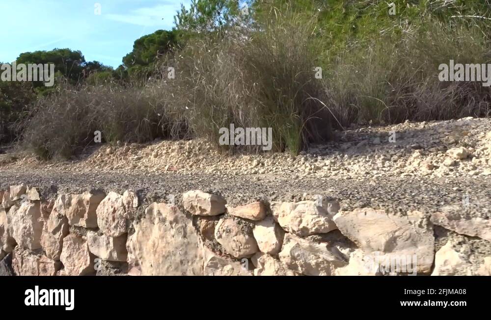 Gravel road with stone wall Stock Videos & Footage - HD and 4K Video ...