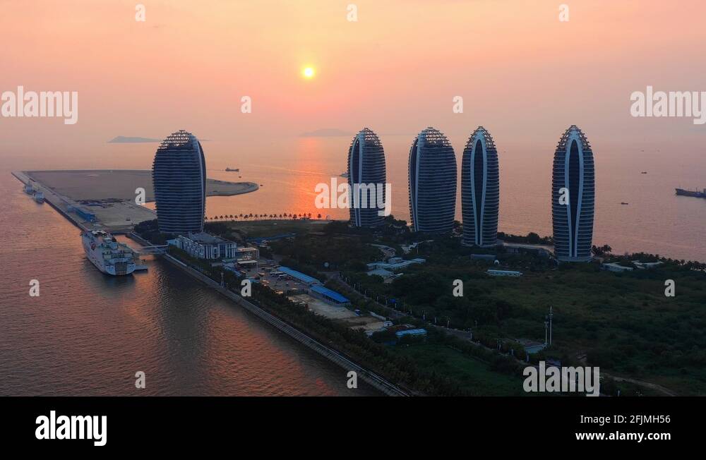 sunset hainan island famous sanya phoenix hotel aerial panorama 4k ...