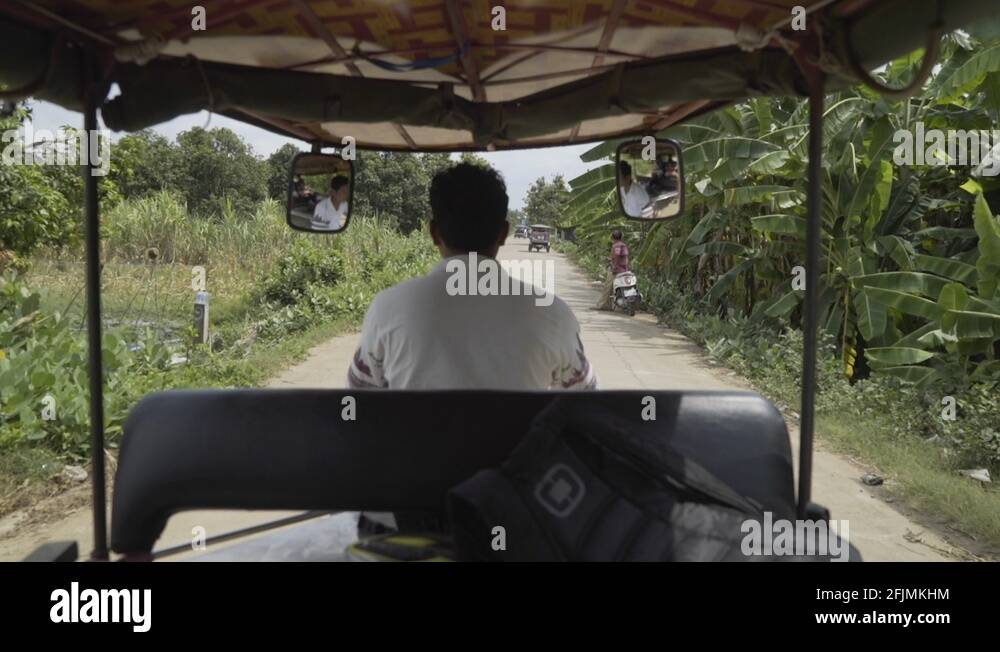 Man in back of tuk tuk Stock Videos & Footage - HD and 4K Video Clips ...