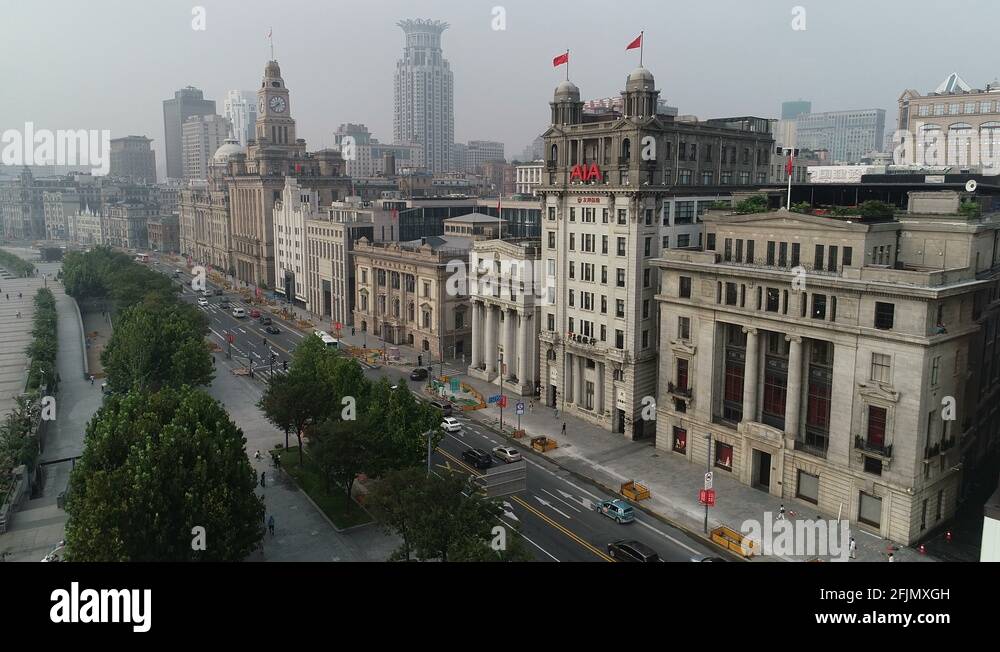 China contrast - drone shot classic Bund buildings modern office towers ...