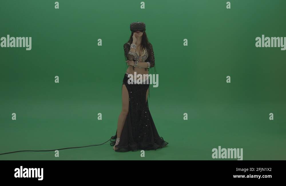 Beautiful Belly Dancer In Vr Headset Operates Invisible Screen Over Chromakey Stock Video