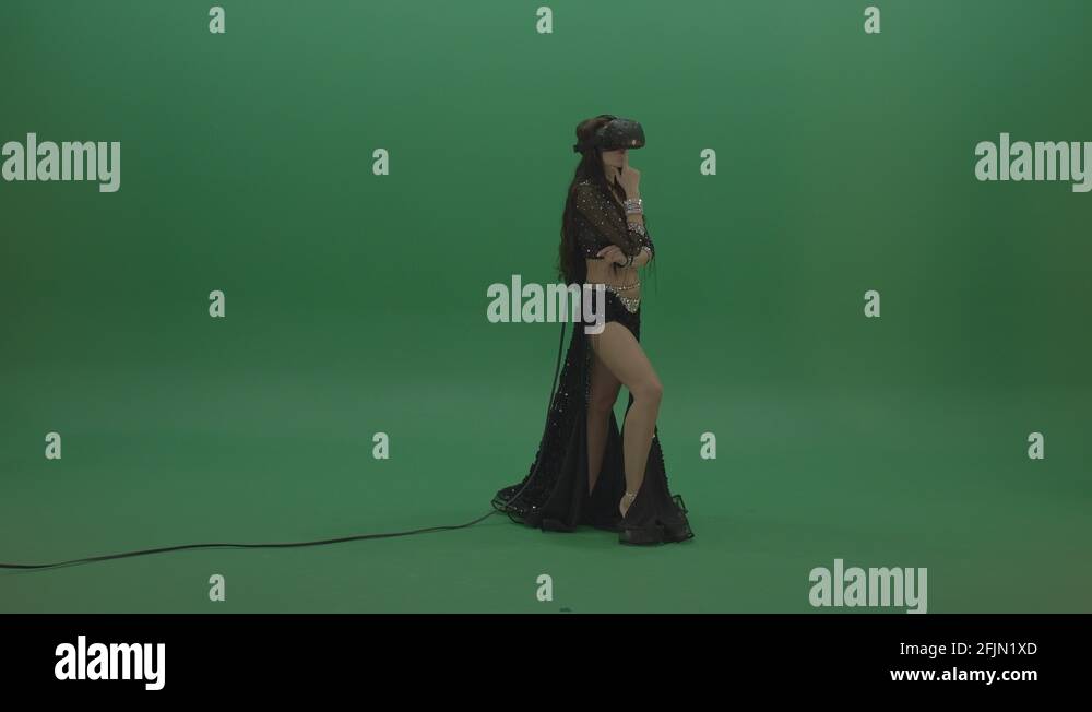 Beautiful Belly Dancer In Vr Headset Operates Invisible Screen Over Chromakey Stock Video