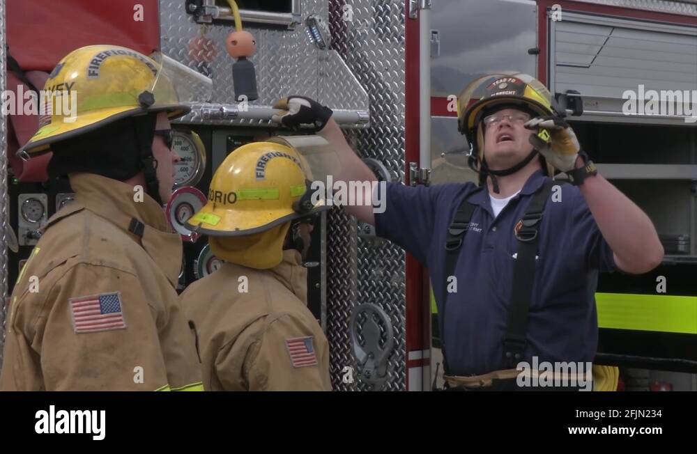 Chief fire fighter checking Stock Videos & Footage - HD and 4K Video ...