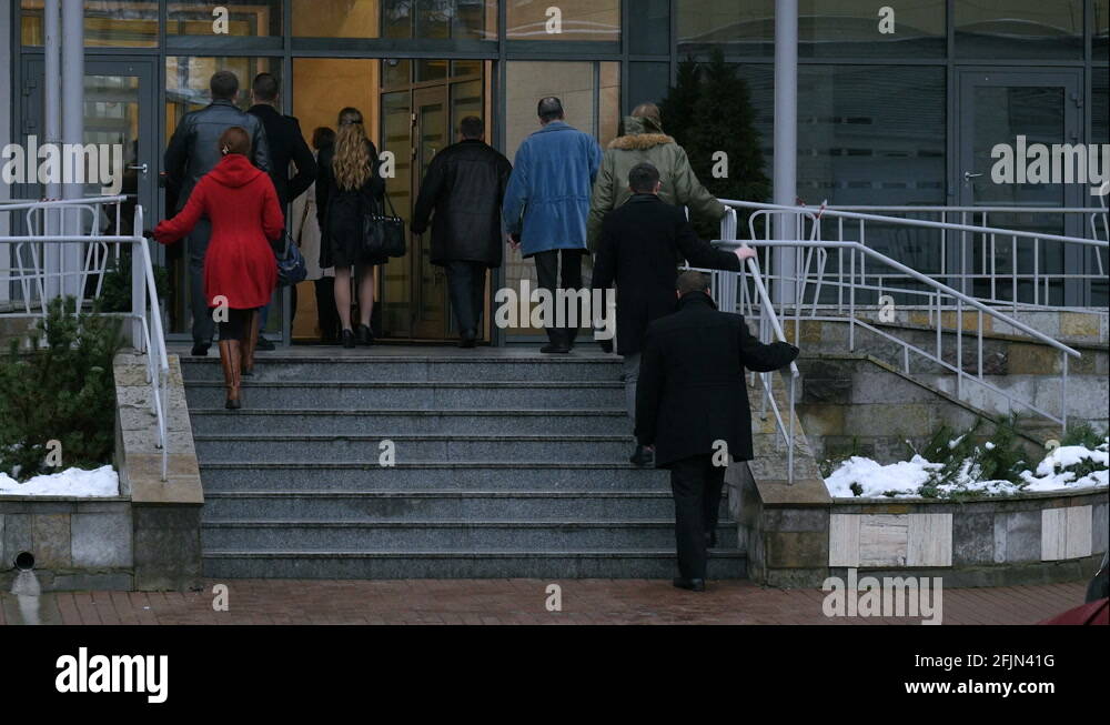 Group of people entering the office building Stock Video Footage - Alamy