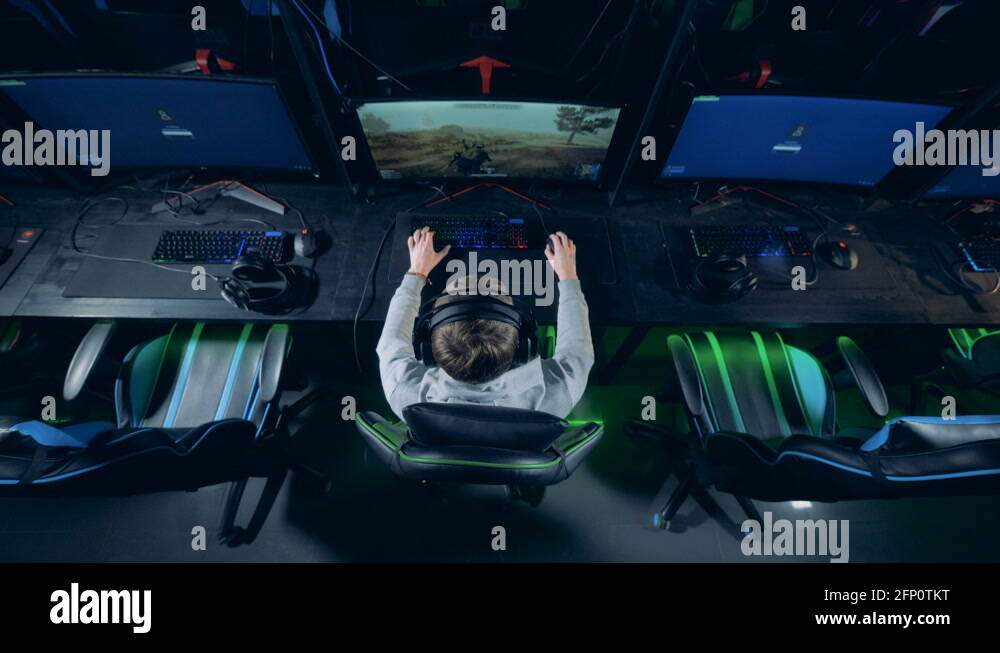 Cyber sportsman sit in a gaming room with computers, top view Stock ...