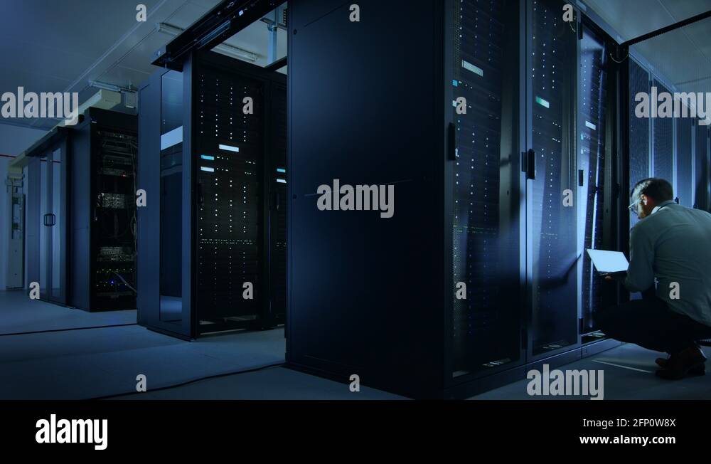 Time Lapse Footage of IT Employees Working in a Data Center Server Room ...