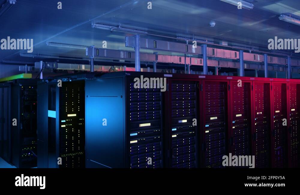 Descending Shot of Data Center With Multiple Rows of Operational Server ...
