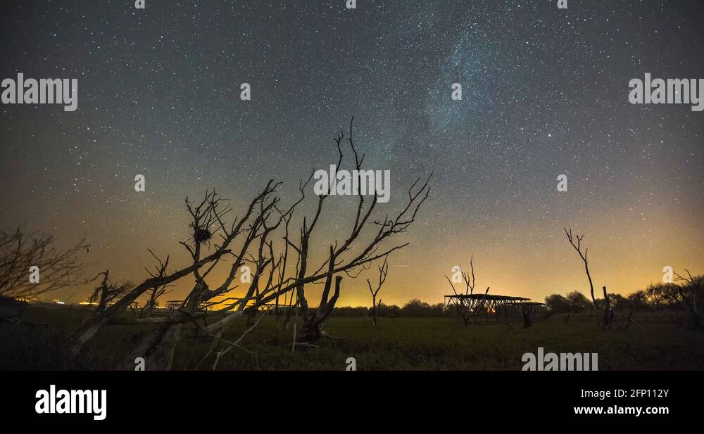 Milky Way galaxy and stars and airliners in night sky time lapse in ...