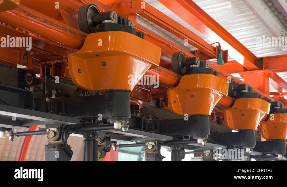 Close up roller coaster mechanism. Machinery coming and going Stock ...