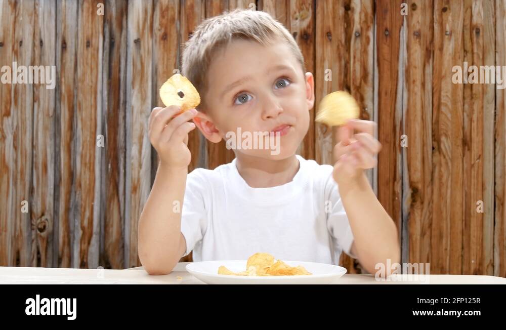 Children eating chips Stock Videos & Footage - HD and 4K Video Clips ...