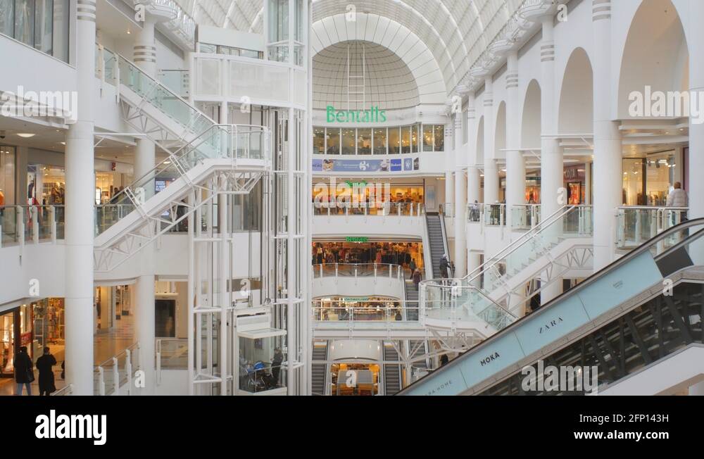 Interior of a large modern shopping centre in a London suburb town ...