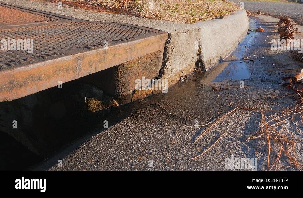 Storm water manhole Stock Videos & Footage - HD and 4K Video Clips - Alamy