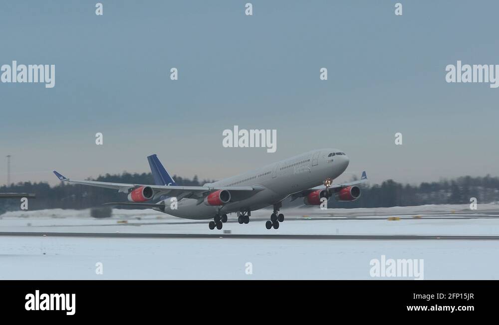 huge airplane airbus a340 take off runway side view panning right Stock ...