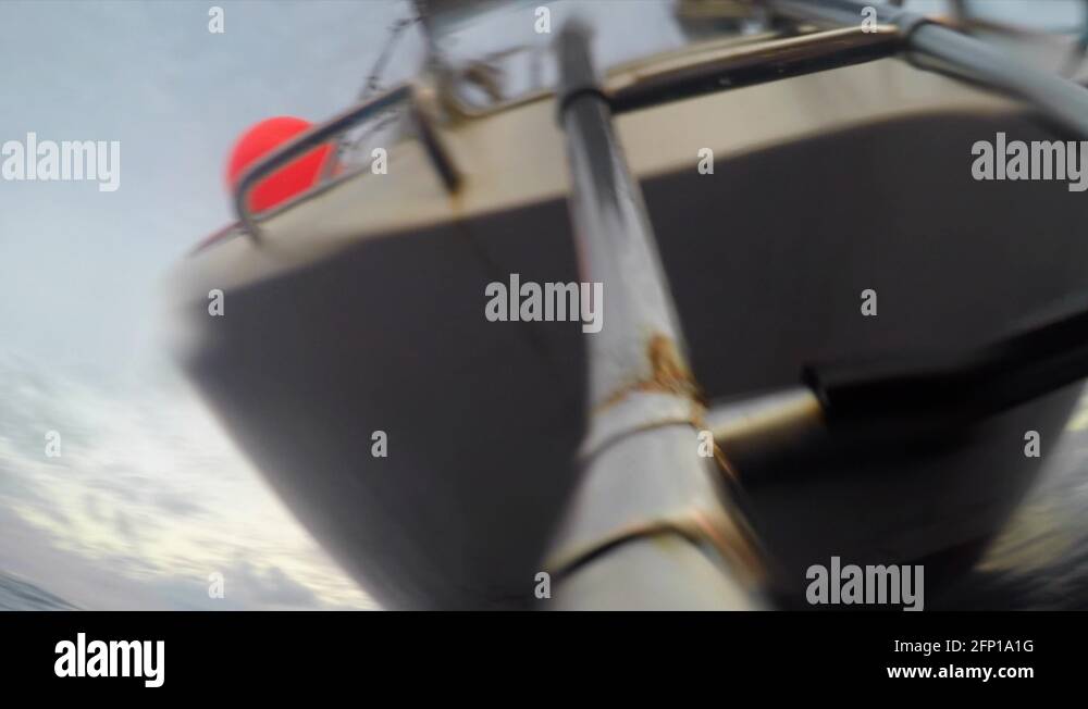 Swimming off a sailboat boat in the Pacific Ocean, slow motion Stock ...