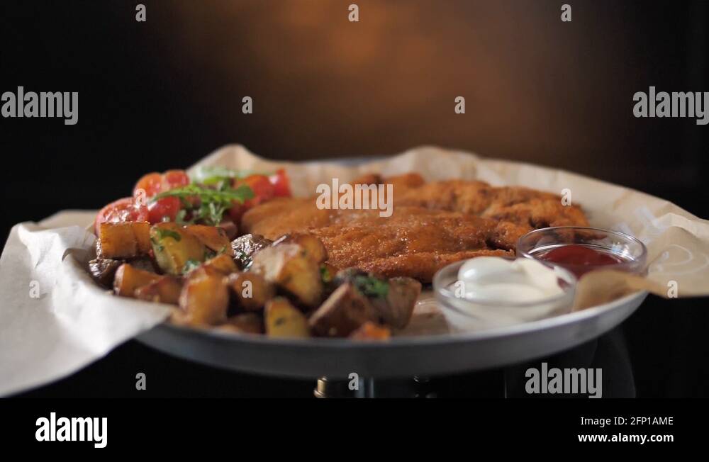 Breaded chicken dish Stock Videos & Footage - HD and 4K Video Clips - Alamy