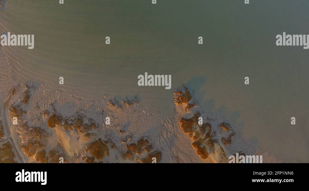 4K Aerial over Calshot Beach and Calshot Activities Centre in the ...