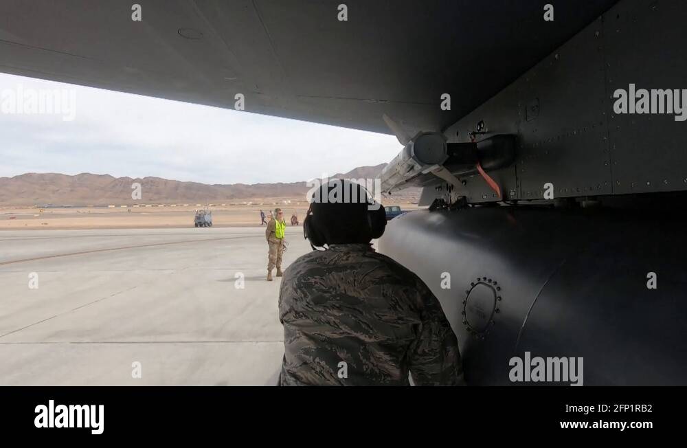 Ground crew removing remove before flight tags from fighter jet Stock ...