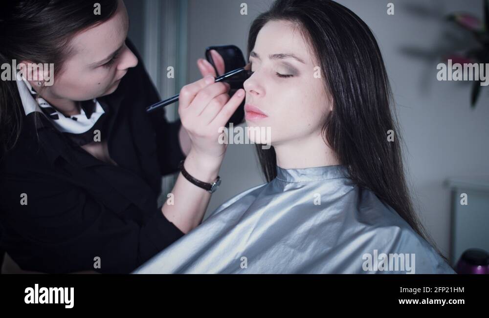 4k Model in Beauty Salon, Make-up Artist Working on Eyes Stock Video ...