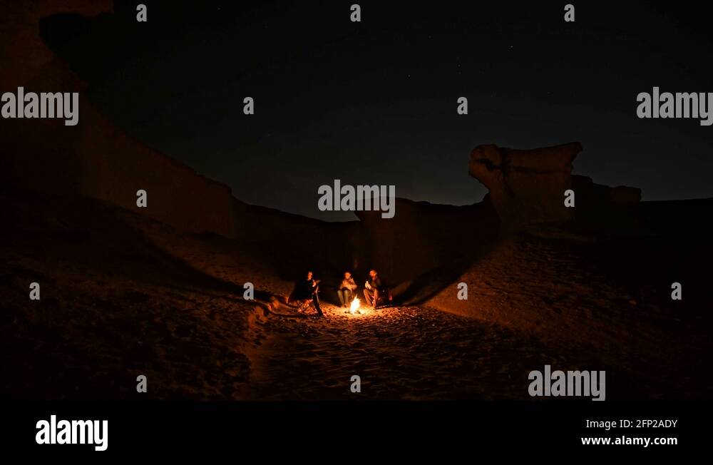 28 December 2018 People next to bonfire in Zekreet desert in Qatar ...