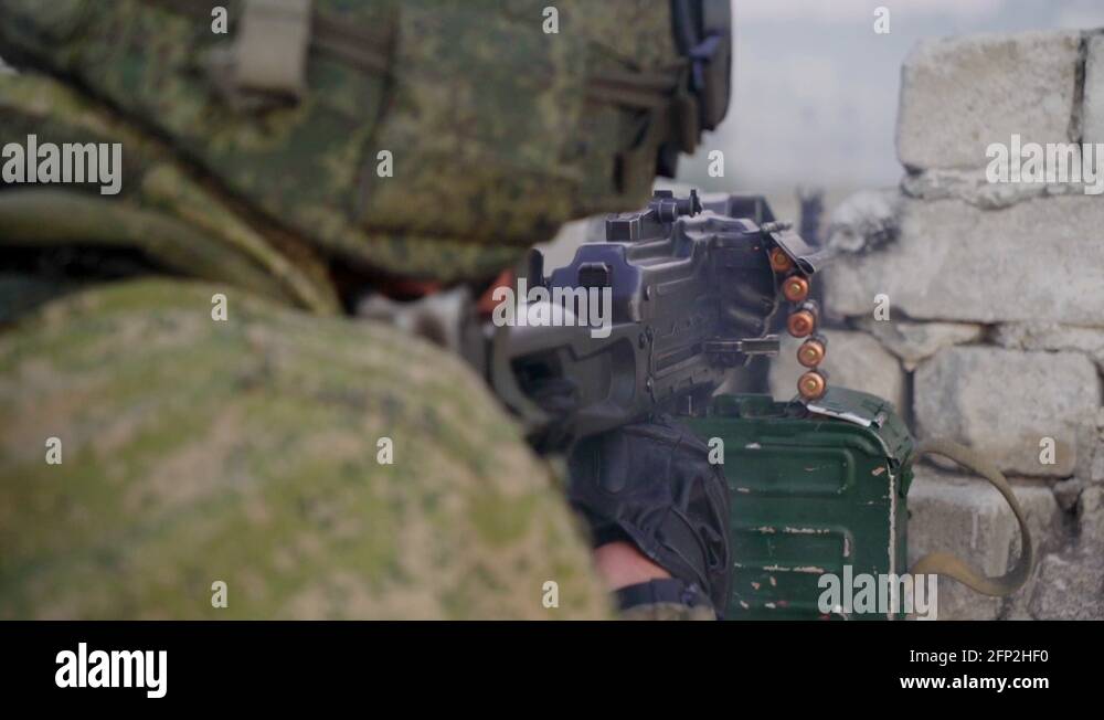 Special Forces soldier firing a machine gun Stock Video Footage - Alamy