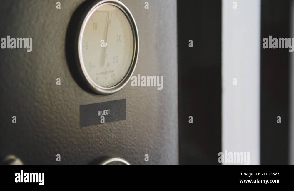Round pressure meters inside a machine room. Tracking down shot Stock ...