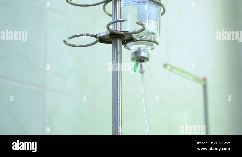 Intravenous injection. Infusion of the drug into a vein through an IV ...