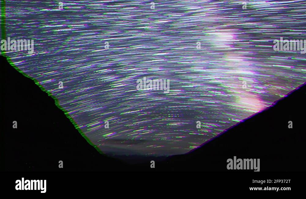 Glitch effect. Traces from stars in the form of lines. Moon rise ...