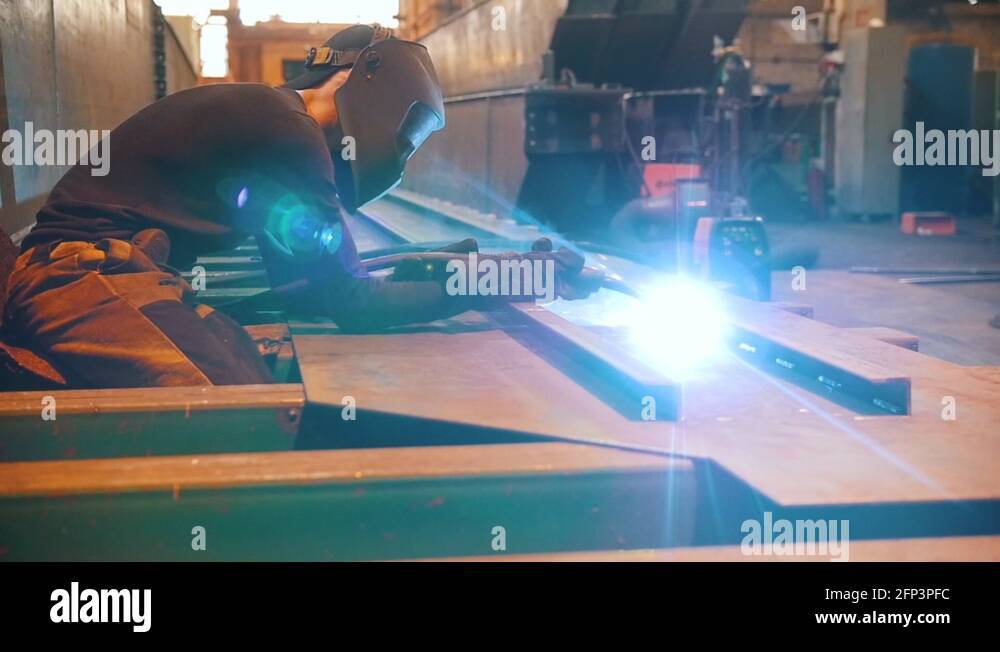 Sitting man welding Stock Videos & Footage - HD and 4K Video Clips - Alamy