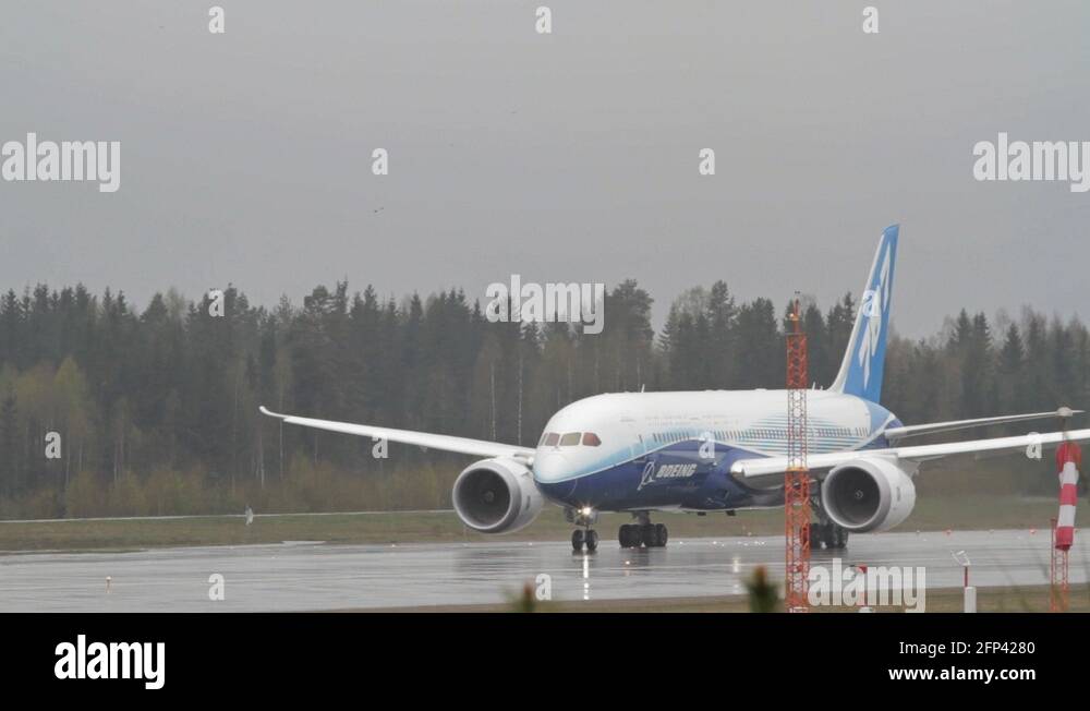 Boeing 787 Dreamliner take off in rainy weather Stock Video Footage - Alamy