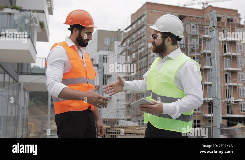 Construction workers shaking hands on Stock Videos & Footage - HD and ...
