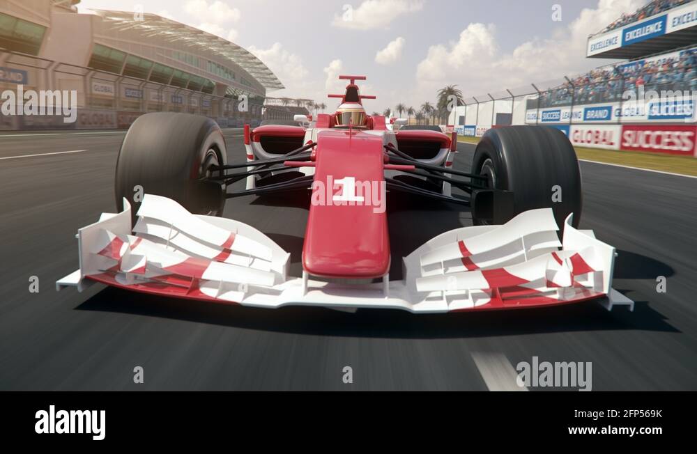 Formula one race car driving across finish line - tilted front view ...