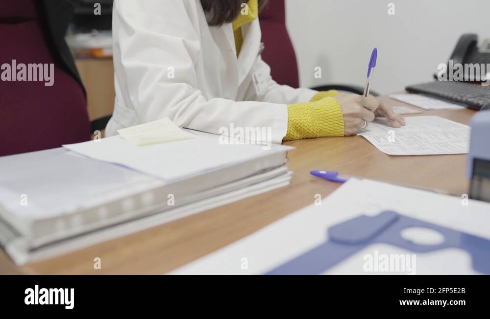 Paperwork table Stock Videos & Footage - HD and 4K Video Clips - Alamy