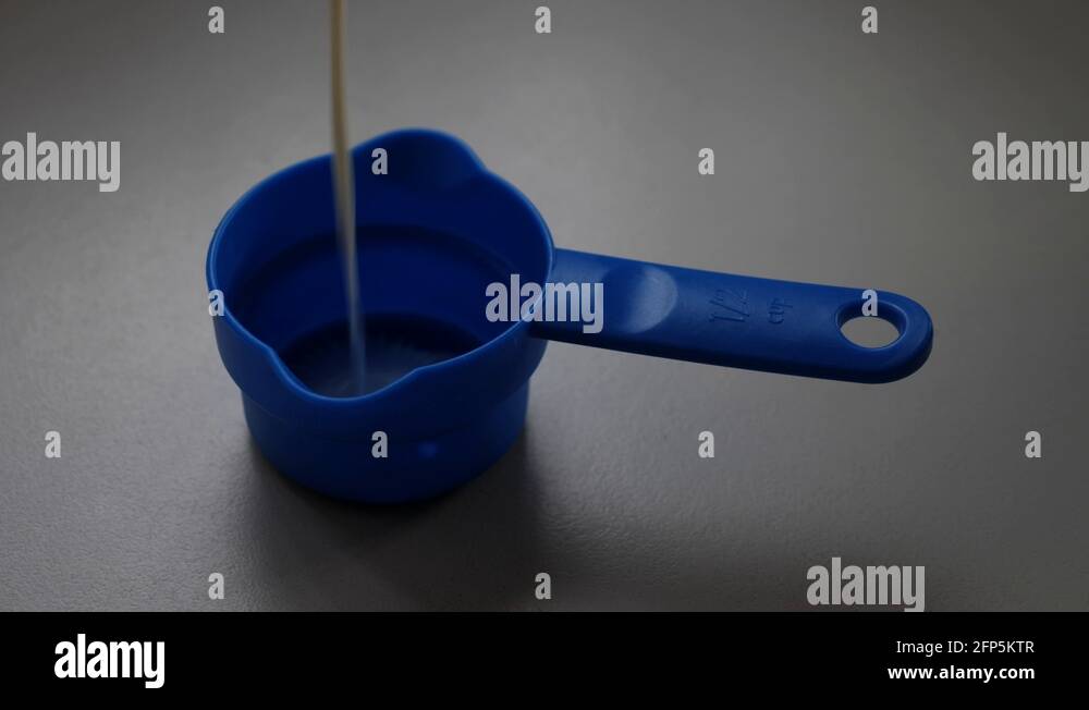 Pouring milk measuring cup Stock Videos & Footage - HD and 4K Video ...