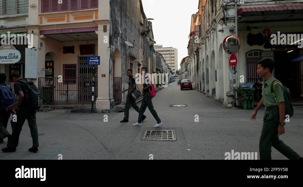 Penang, Malaysia - May 2019: Slow motion gimbal through an outside wet ...