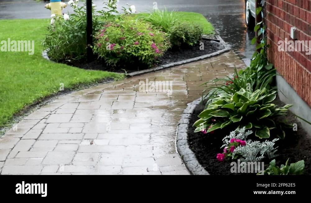 Rain on walkways Stock Videos & Footage - HD and 4K Video Clips - Alamy