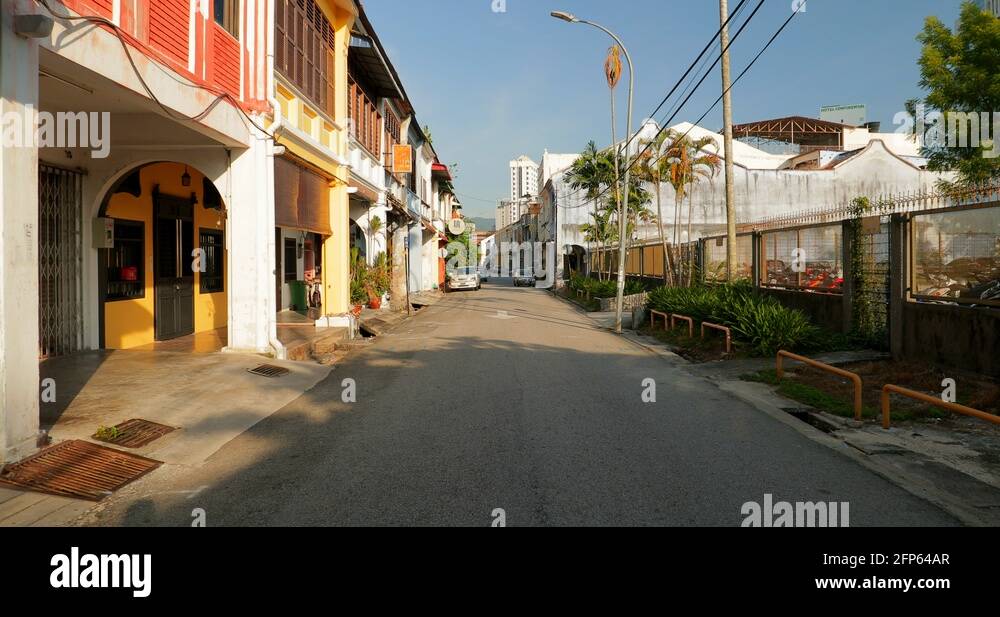 Penang, Malaysia - May 2019: Slow motion gimbal through an outside wet ...