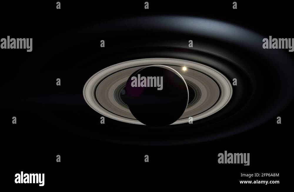 Planet Saturn Revolving around Sun, Backlit Black Background with Copy ...