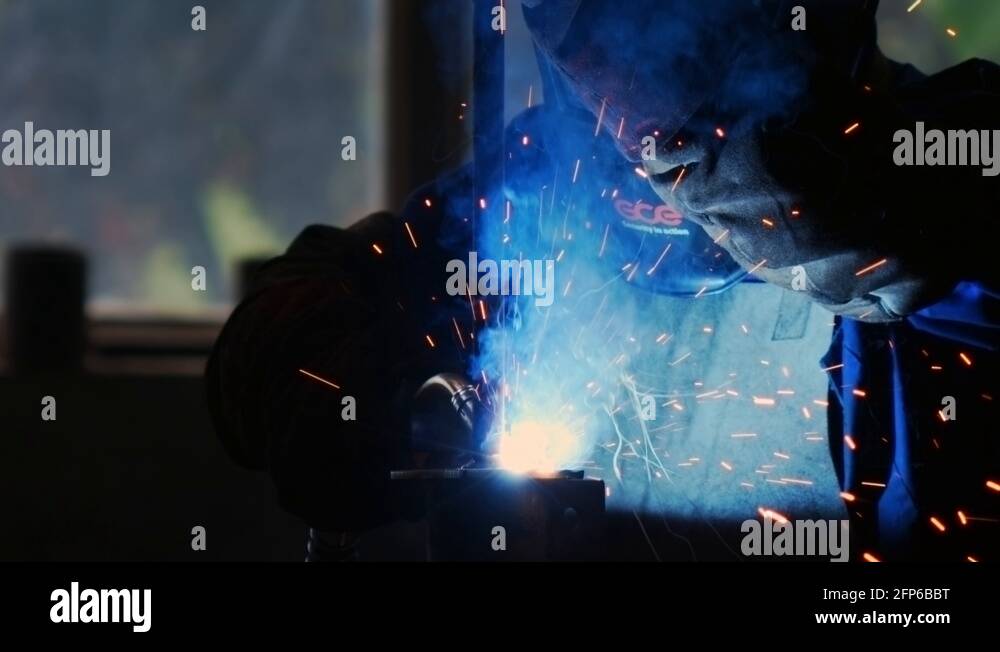 Welder using MIG welding procedure Stock Video Footage - Alamy