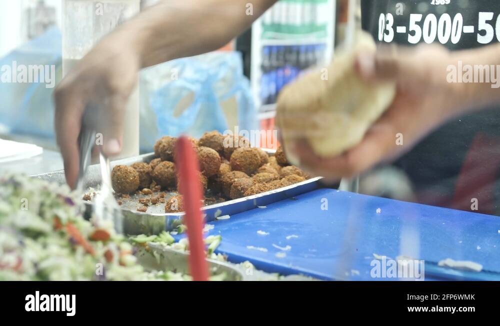 Falafel street food Stock Videos & Footage - HD and 4K Video Clips - Alamy