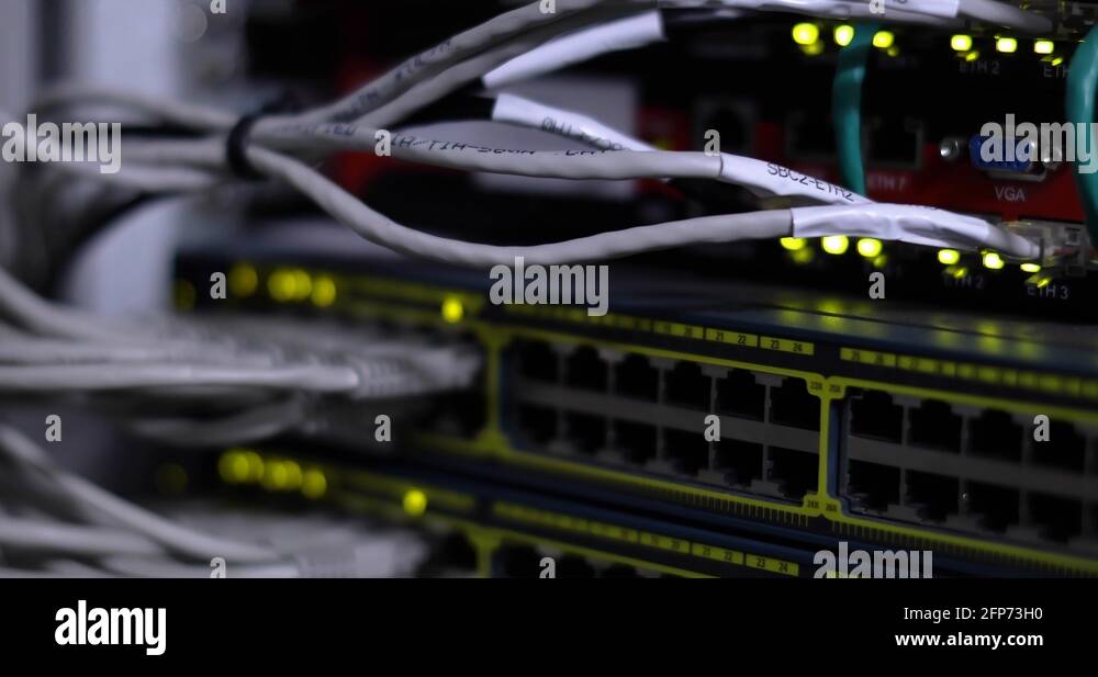 Switch And Optic Cable Connected To Network Panel With Blinking Leds ...