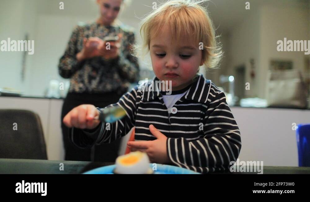 Baby eat egg Stock Videos & Footage - HD and 4K Video Clips - Alamy