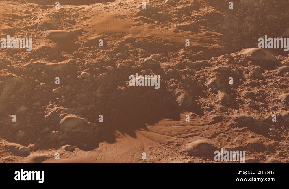 Rocky surface of Mars with sunset shadows growing long, Aerial Orbit ...