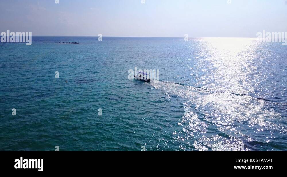 360 wide view of speedboat sailing on lagoon between two tropical ...