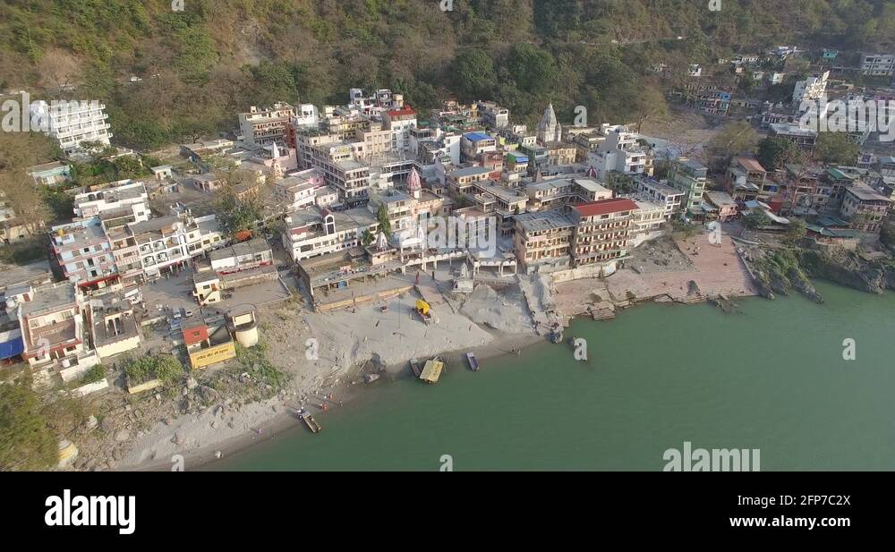 Rishikesh city buildings on Ganges riverbank, India, aerial view Stock ...