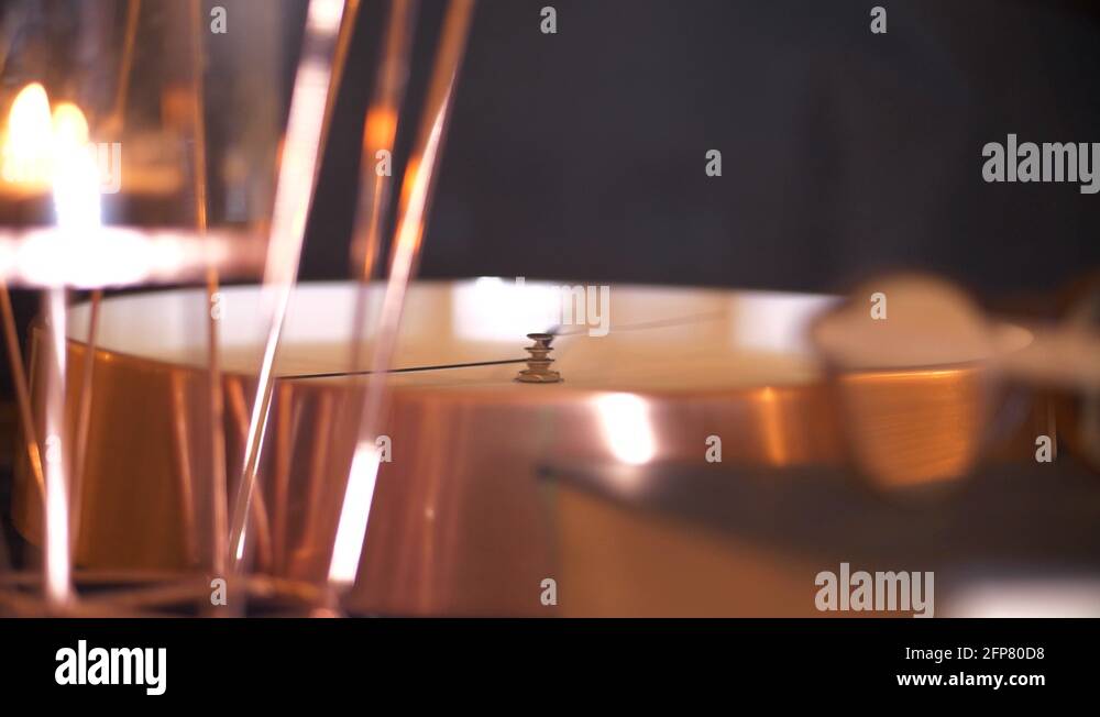 Concept of time close up, smoke around copper objects on black ...