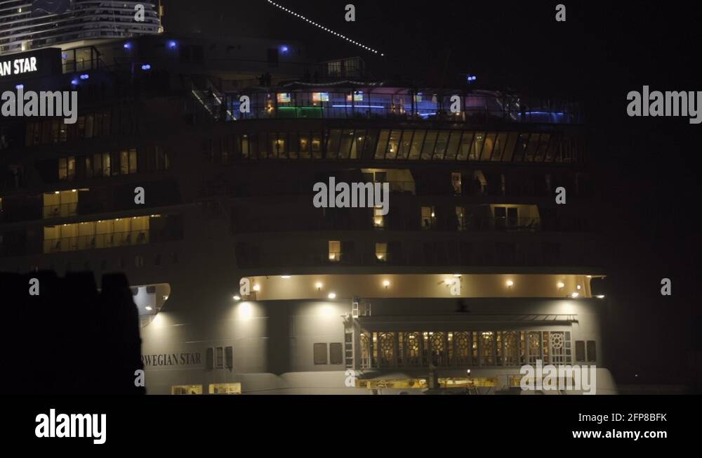 Cruise Ship Rear Behind Mooring Post at Night Stock Video Footage - Alamy